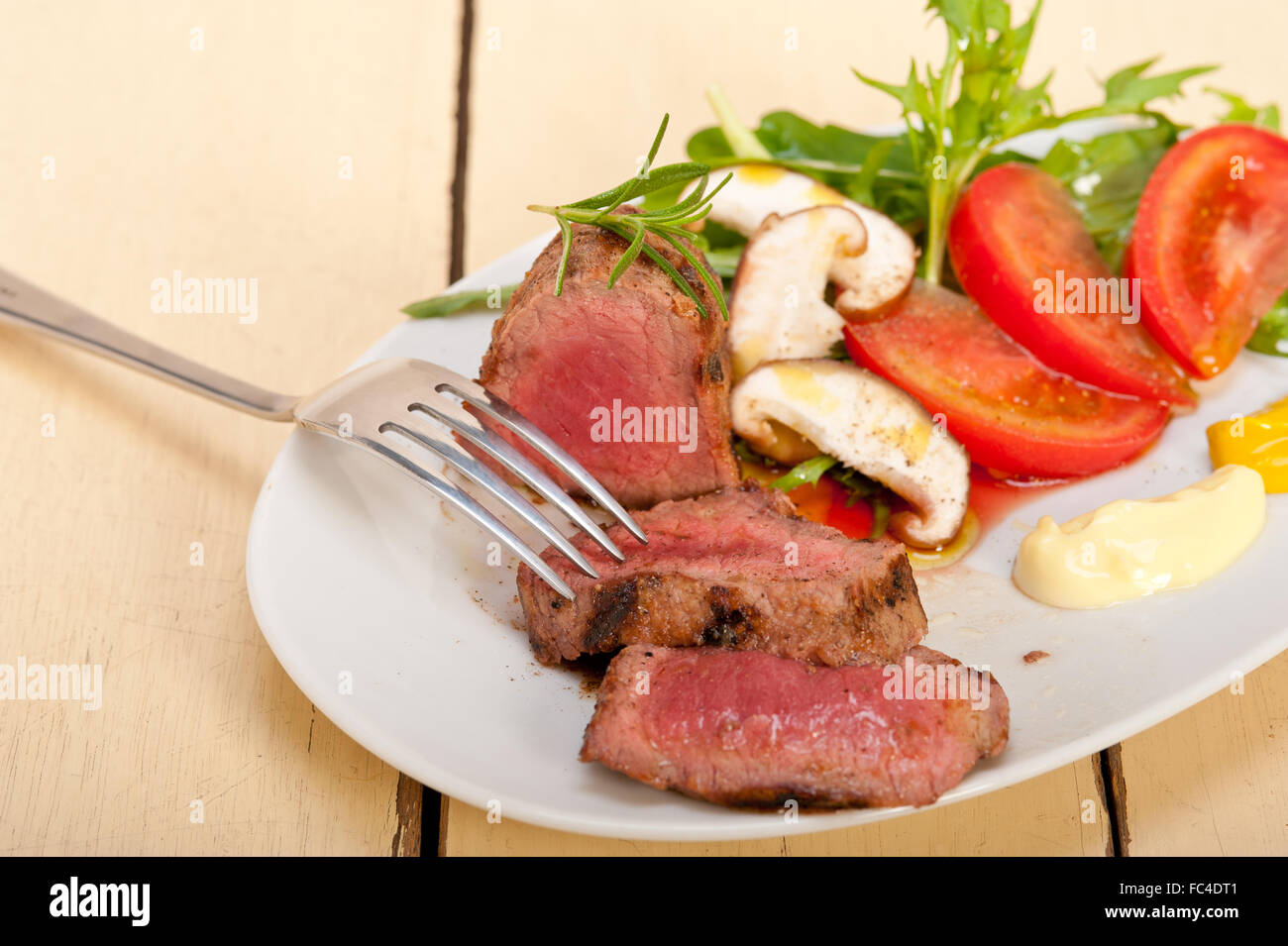beef filet mignon grilled with vegetables Stock Photo - Alamy