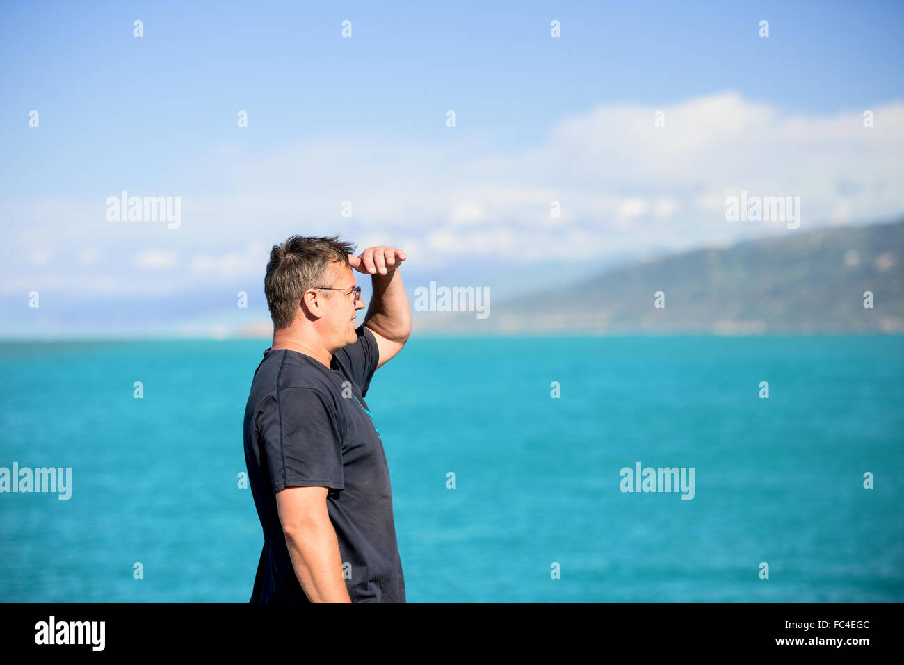 man looking far away Stock Photo - Alamy