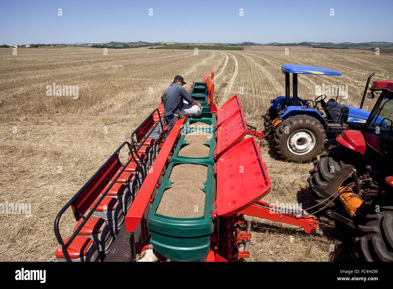 Planter loaded fertilizer to soybean field Stock Photo - Alamy