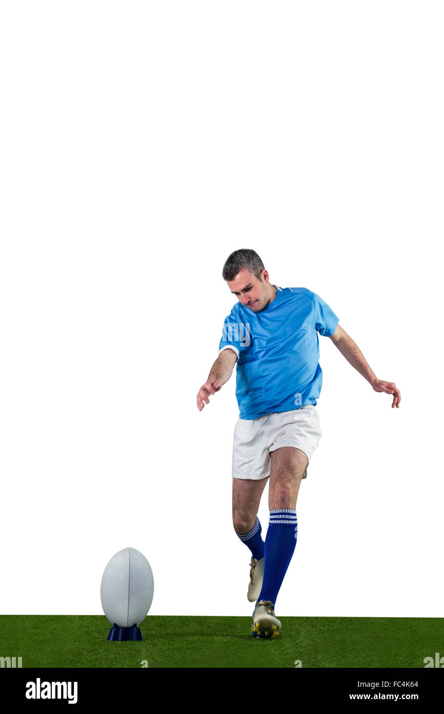 Rugby player doing a drop kick Stock Photo - Alamy