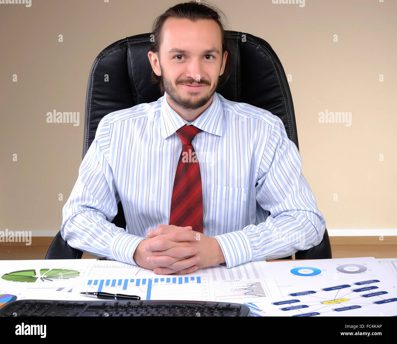 Portrait of a young successful business person in the office Stock ...