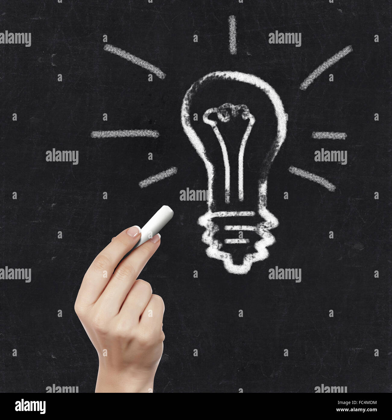 School blackboard and hand with chalk writing on it Stock Photo - Alamy