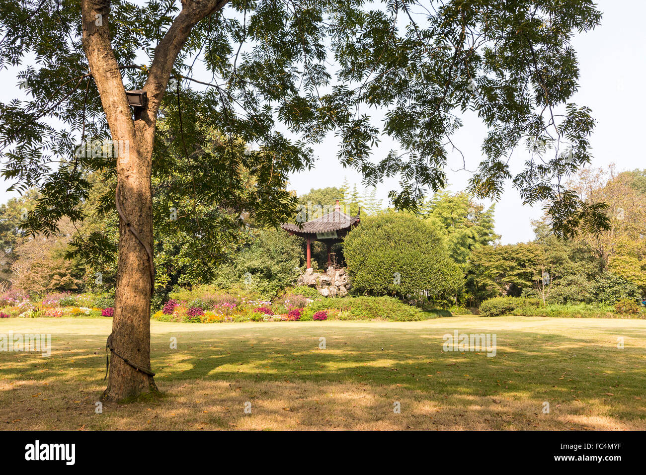 One of many small temples along the shore of West Lake, a freshwater ...