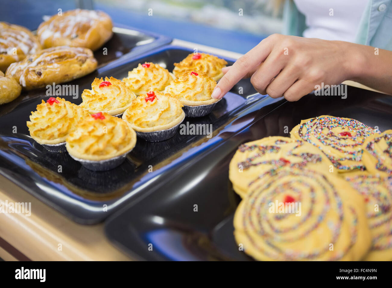 A baker presenting a new plates with pastries Stock Photo - Alamy