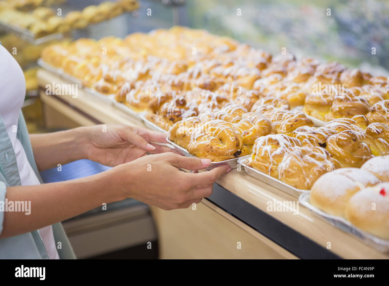 A baker presenting a new plates with pastries Stock Photo - Alamy