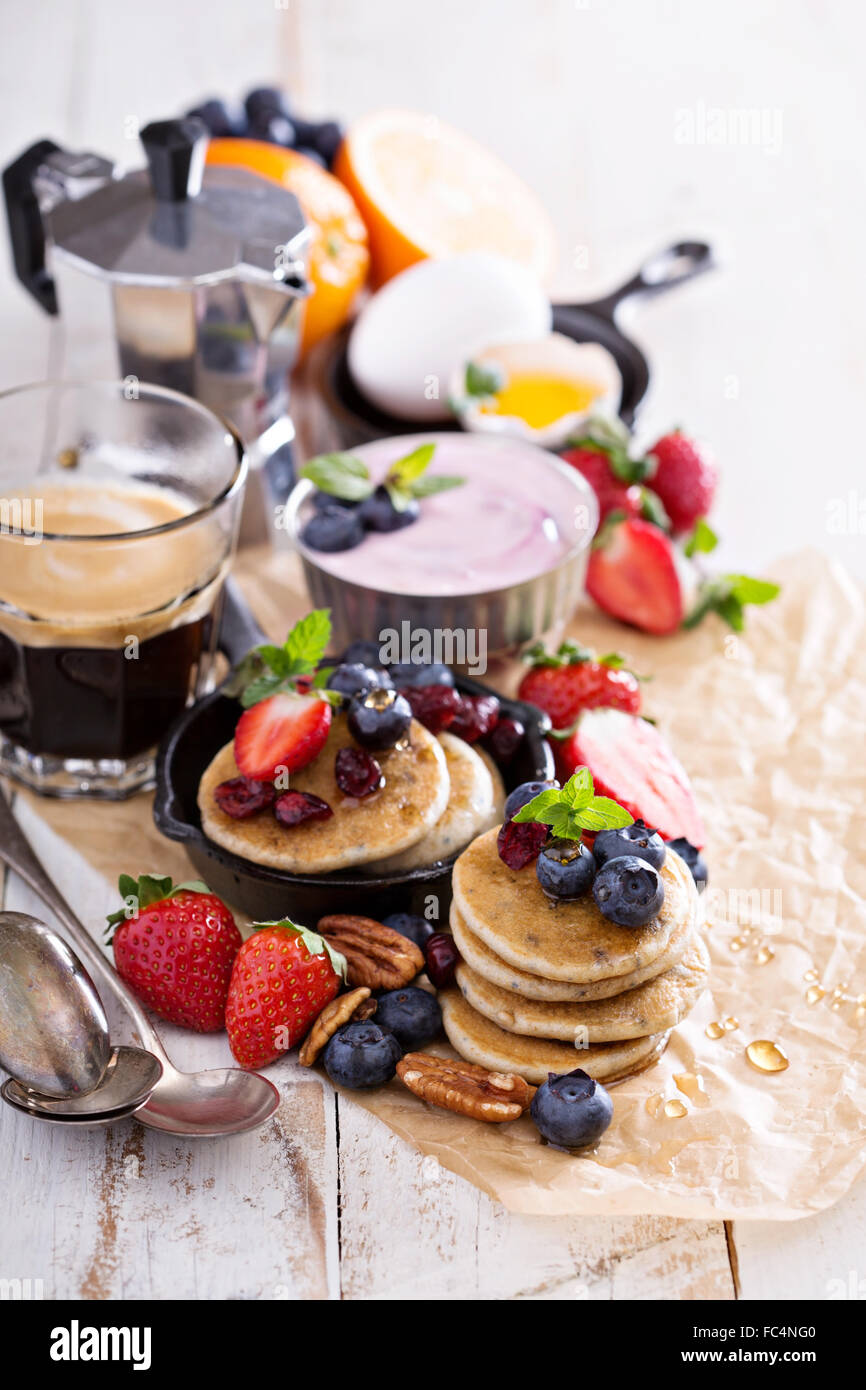 Colorful and tasty breakfast ingredients on white table Stock Photo - Alamy