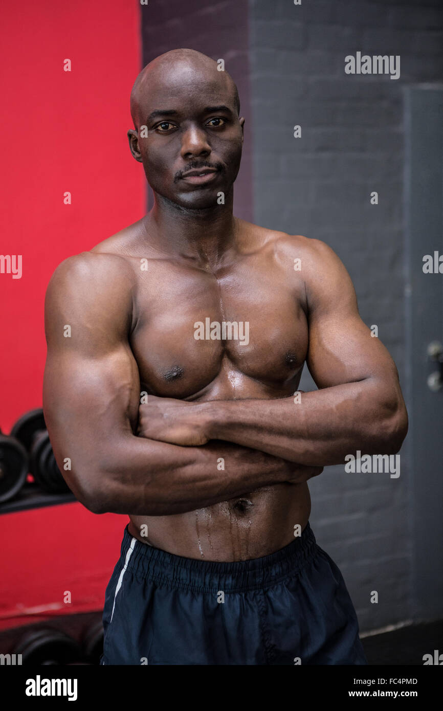 Young Bodybuilder posing in front of the camera Stock Photo - Alamy