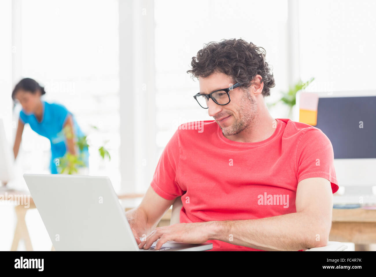 Agency workplace colleague editor hi-res stock photography and images ...