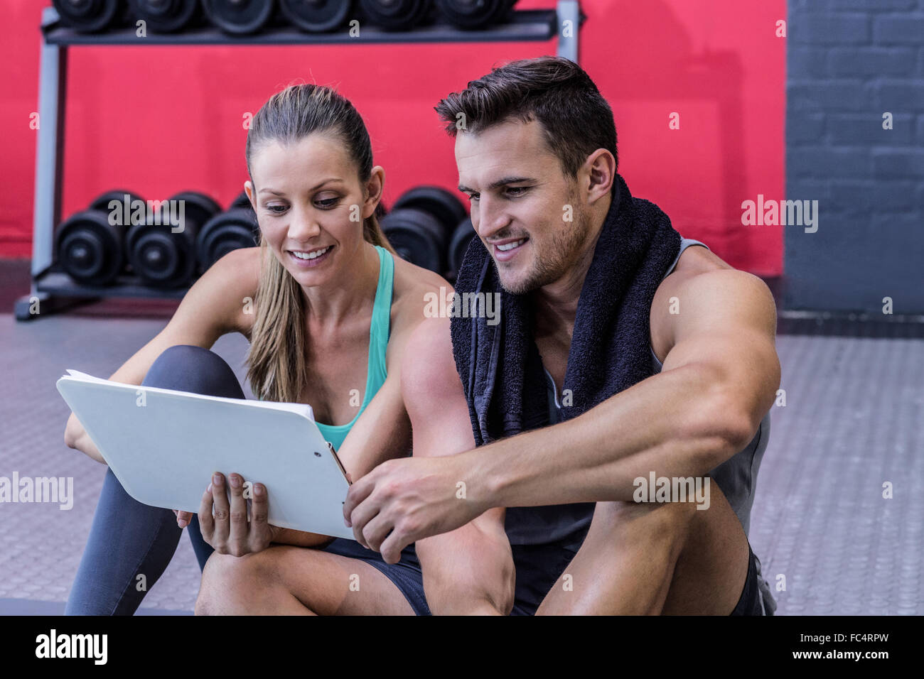 Smiling female coach explaining hi-res stock photography and images - Alamy