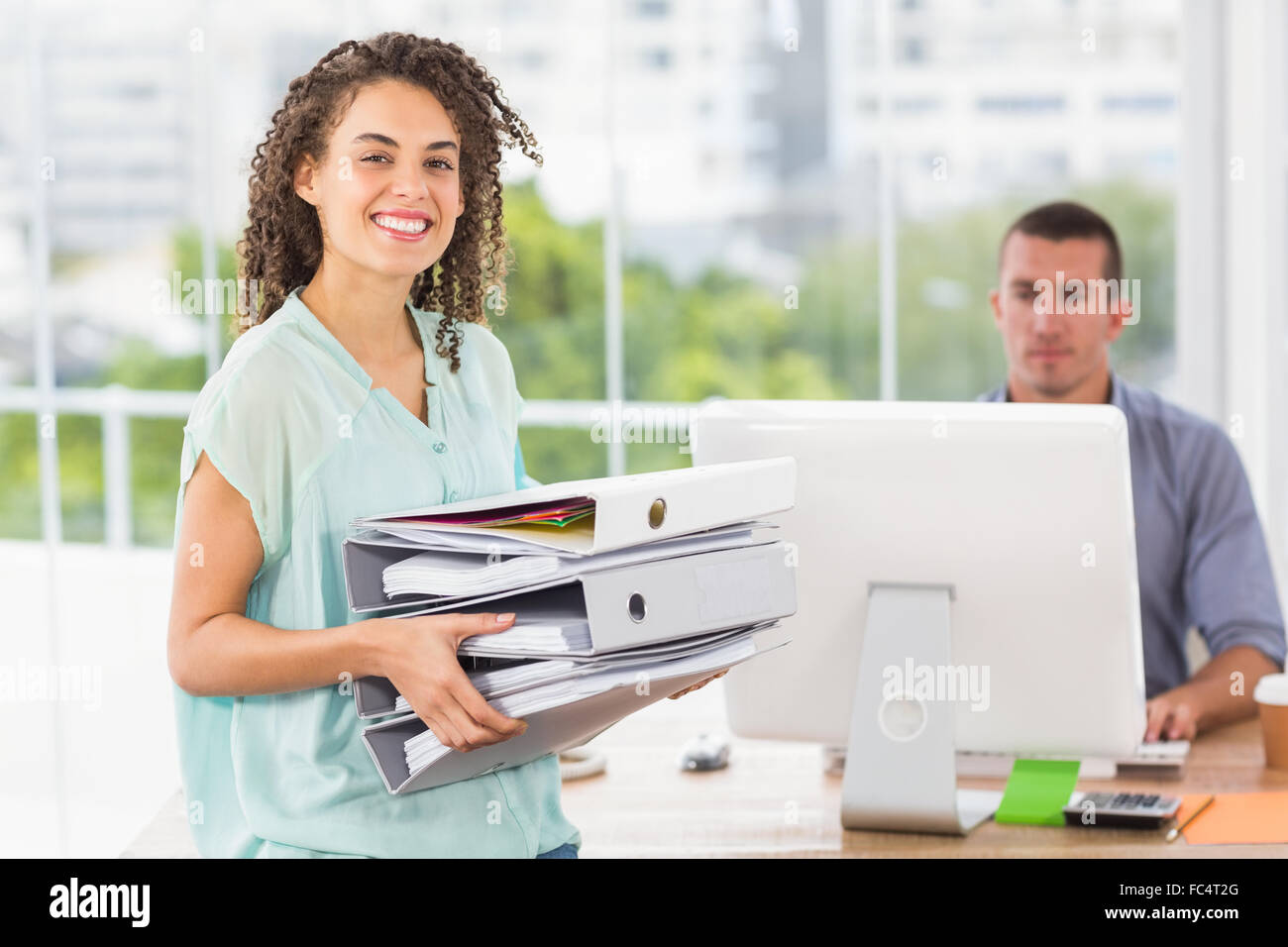 Woman carrying computer monitor hi-res stock photography and images - Alamy