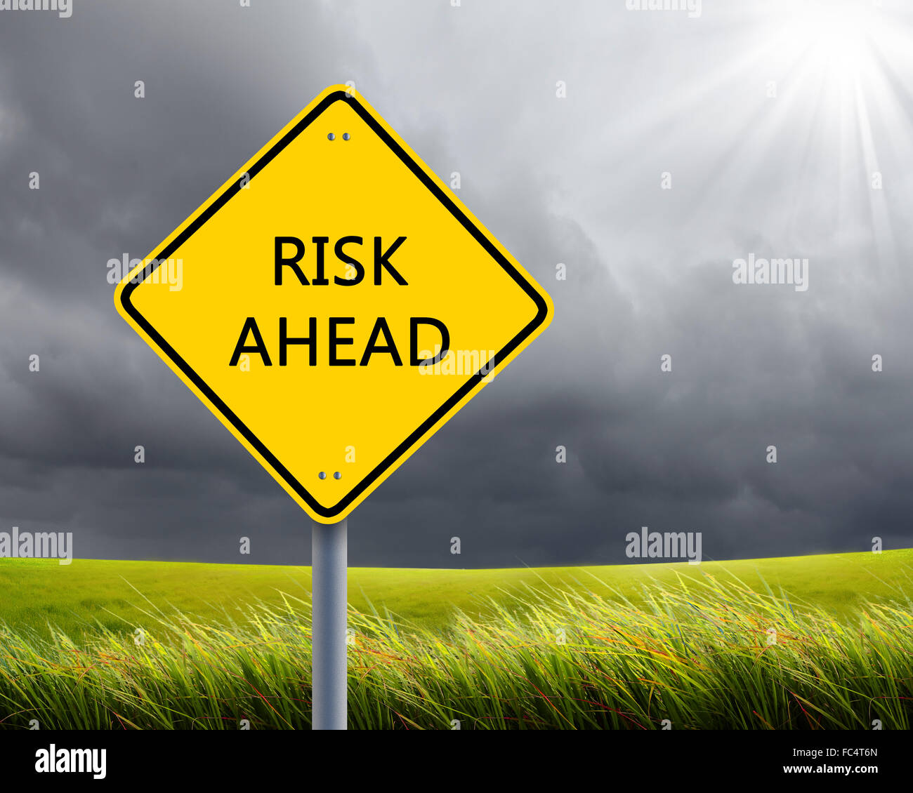 yellow road sign as a warning of risk ahead Stock Photo - Alamy