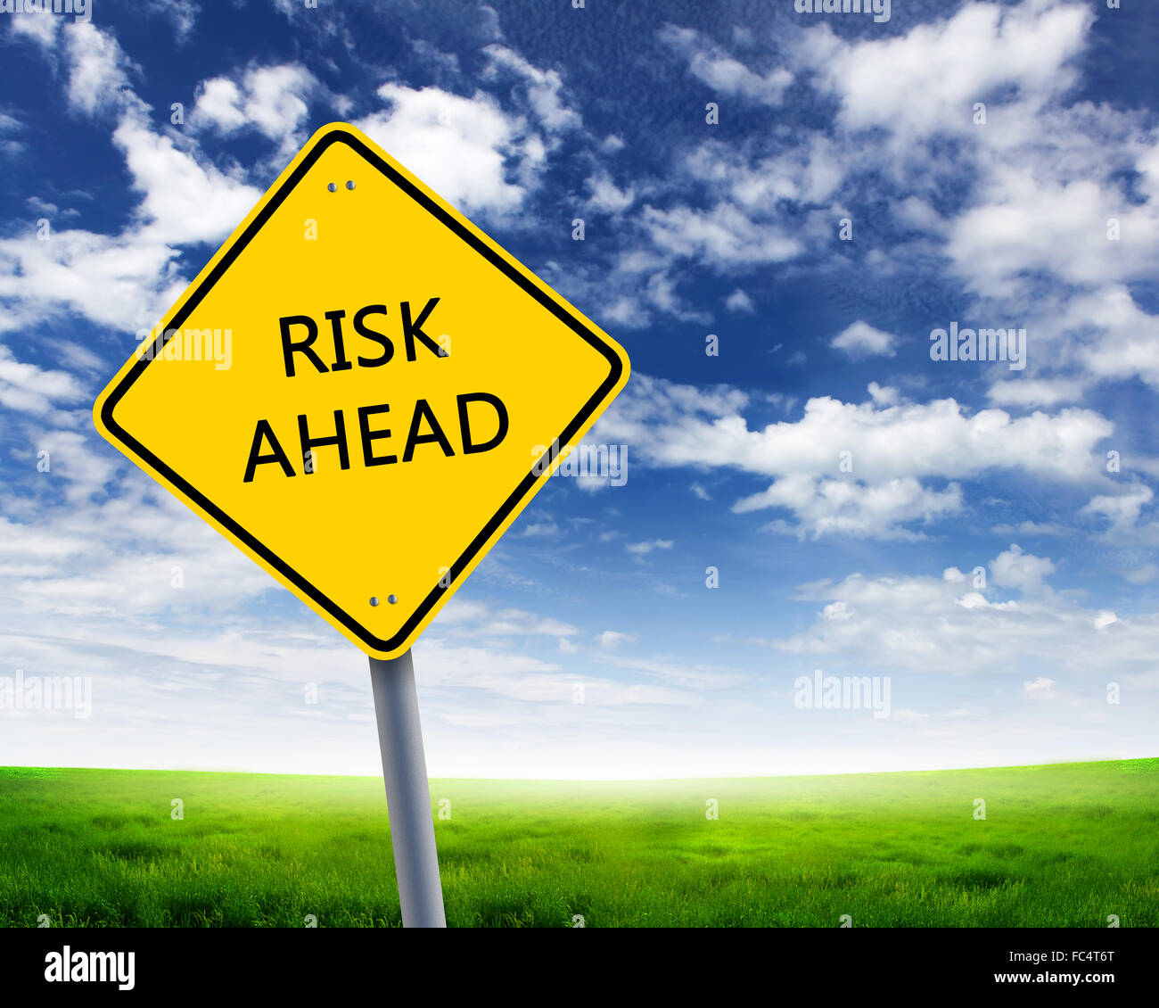 yellow road sign as a warning of risk ahead Stock Photo - Alamy
