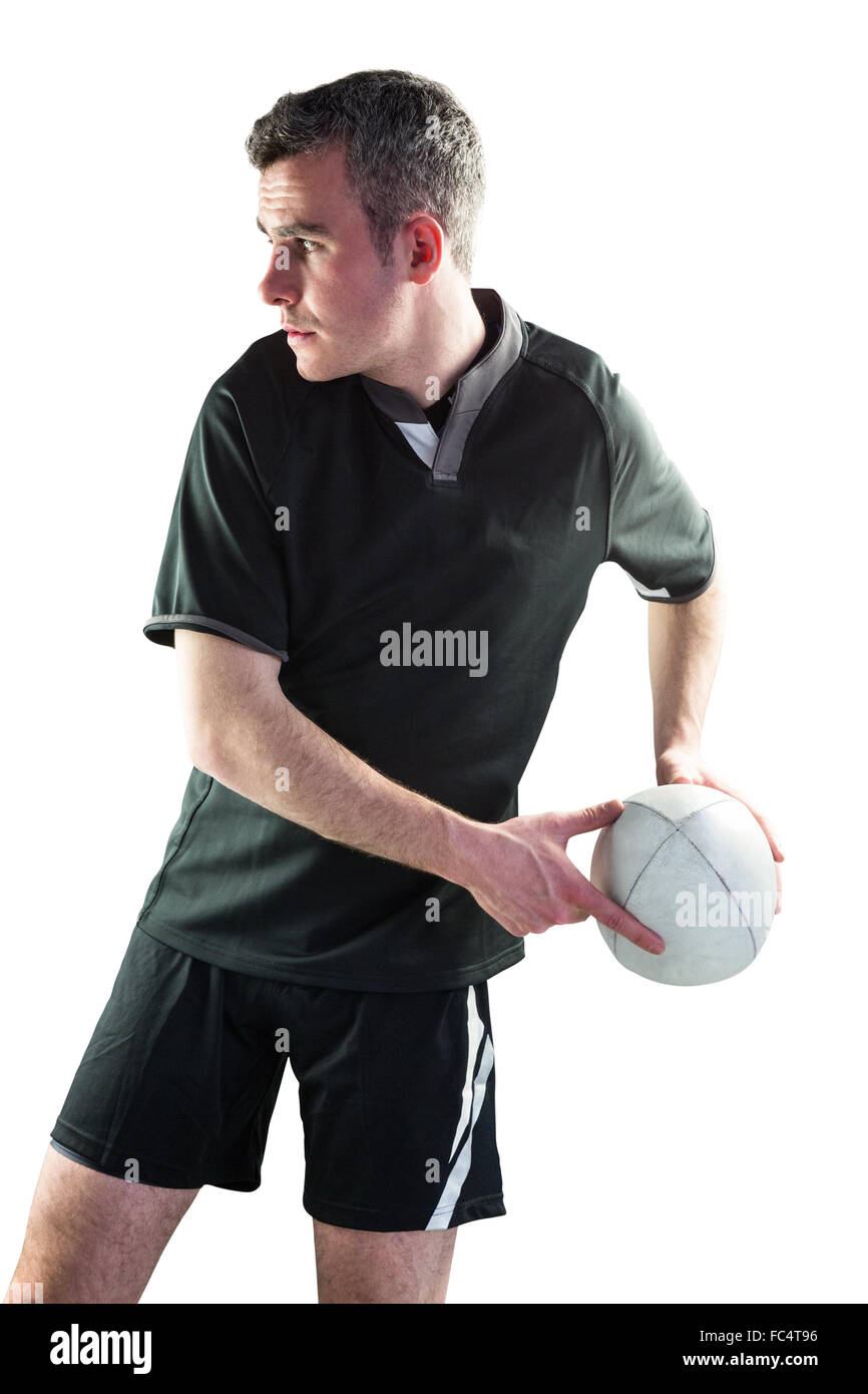 Rugby player doing a side pass Stock Photo - Alamy