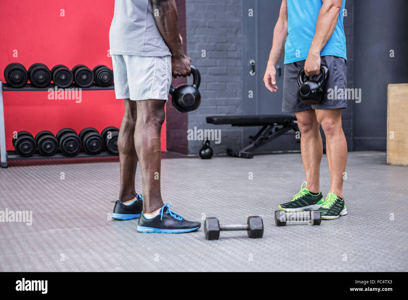 Two young Bodybuilder standing in front of each other Stock Photo - Alamy