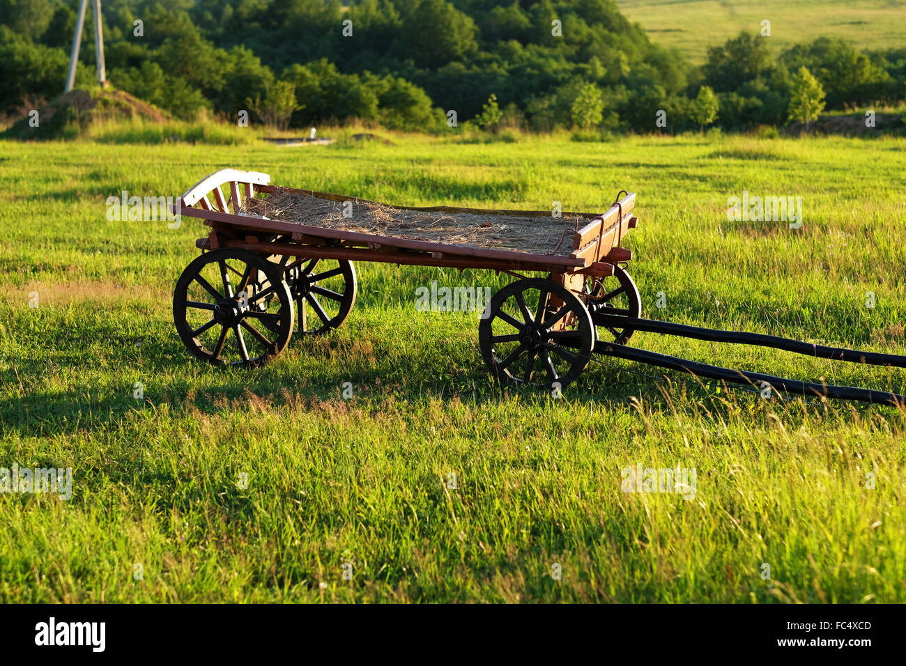 Rural landscape with wooden cart Stock Photo - Alamy