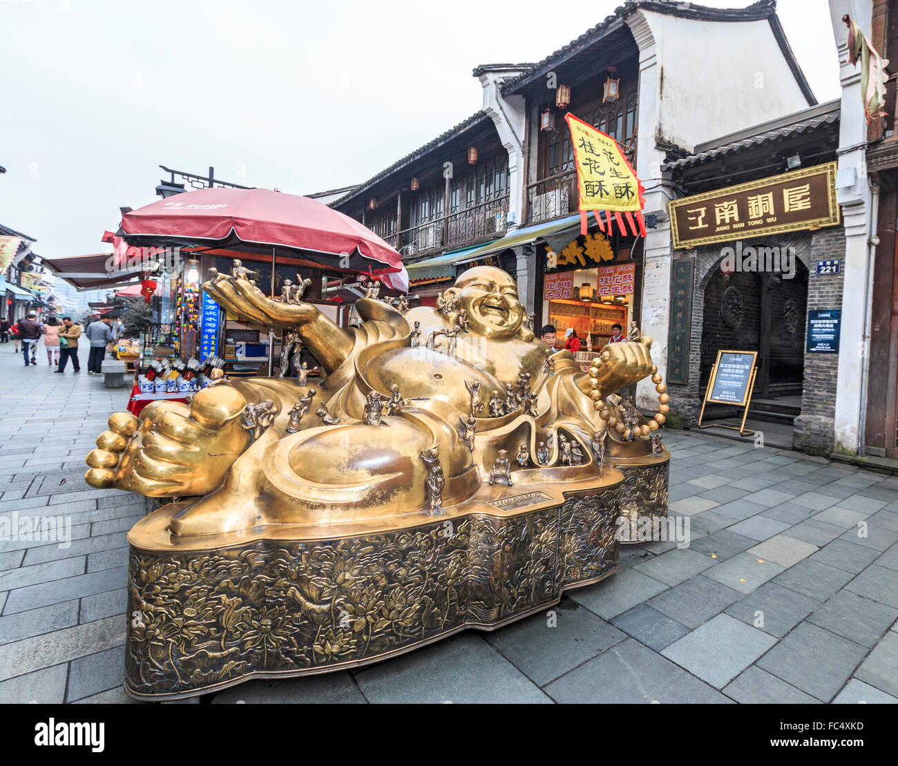 Buddha statue at start of Qinghefang Ancient Street, which is lined ...
