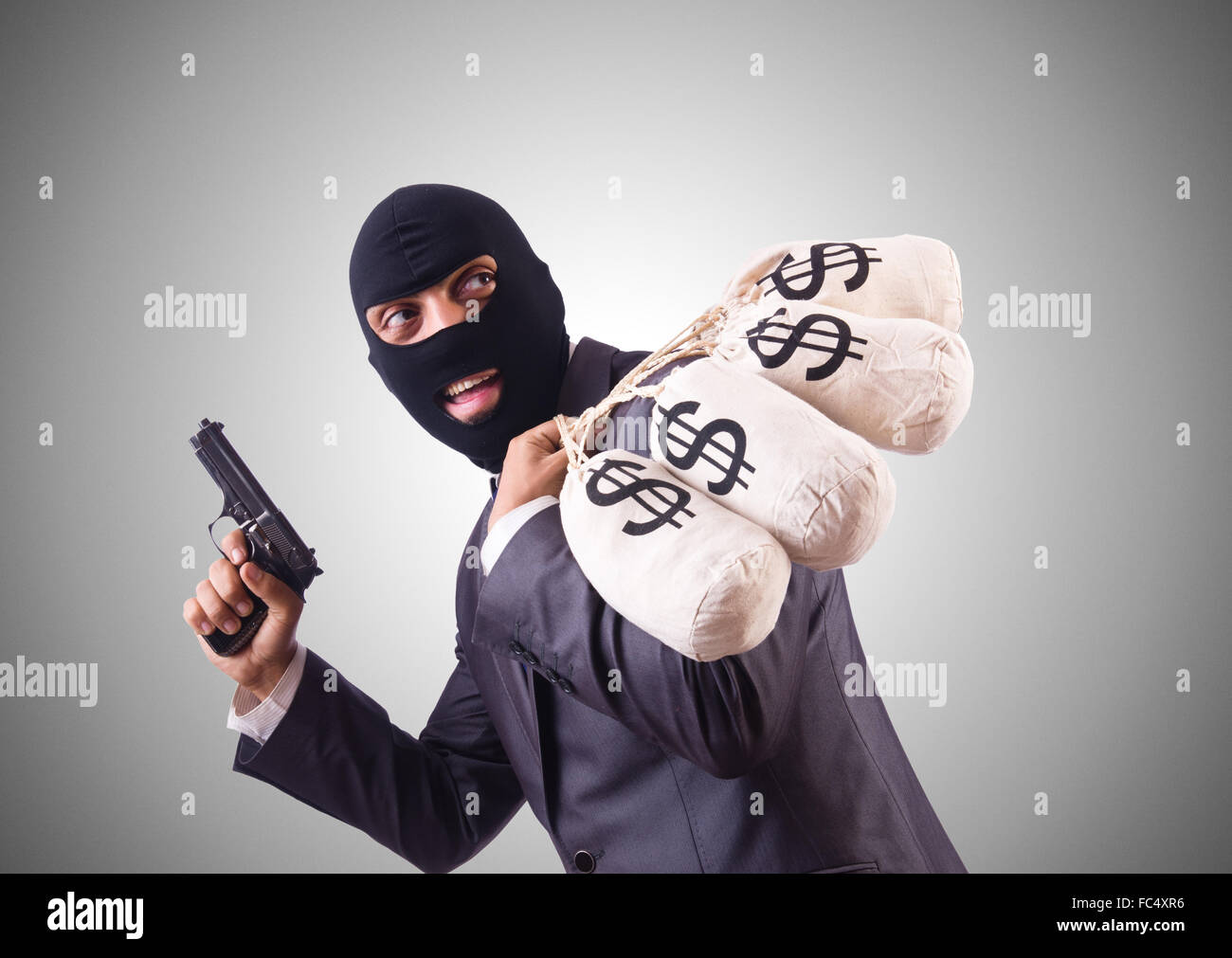 Gangster with bags of money against the gradient Stock Photo - Alamy