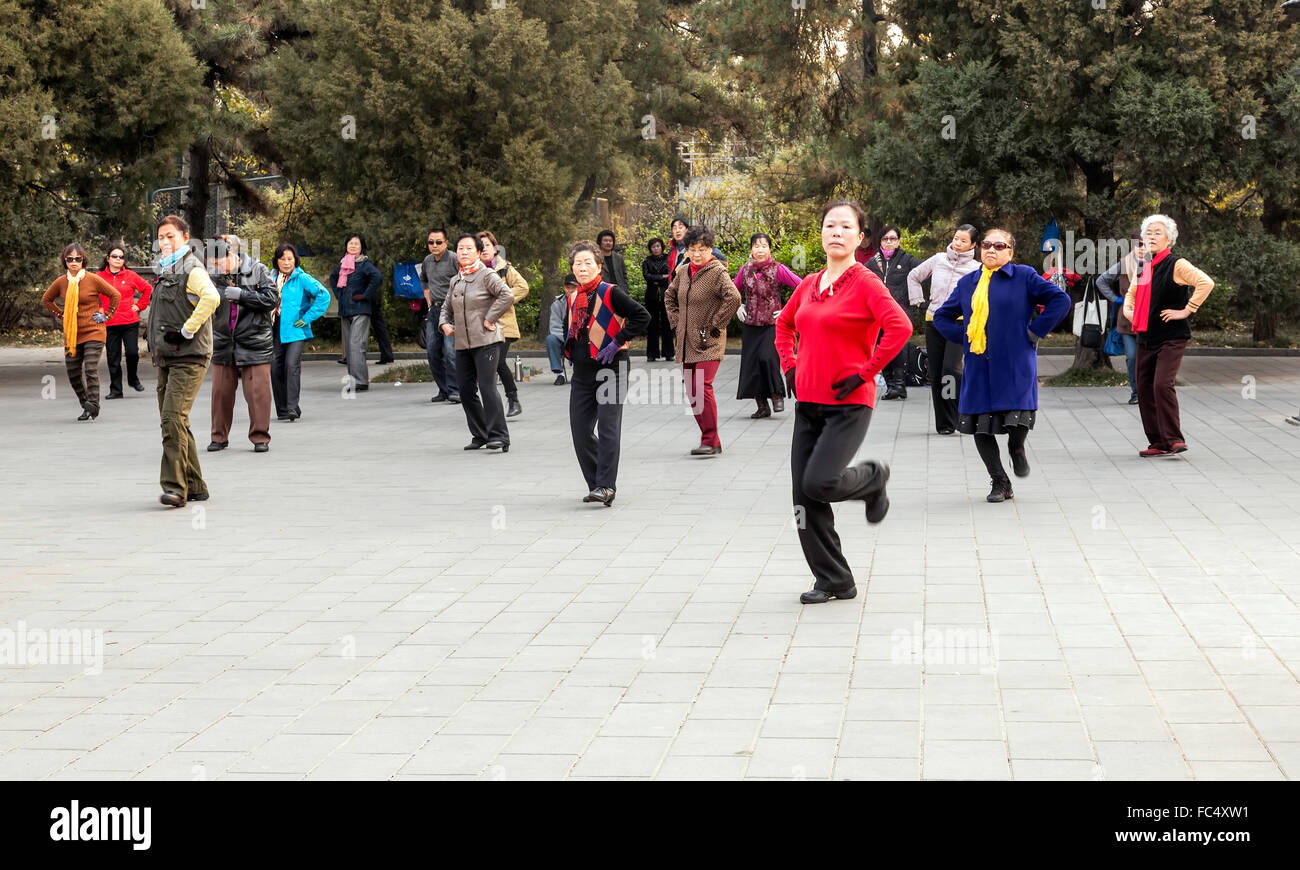 Early morning exercise in the garden of the Temple of Heaven in Beijing ...