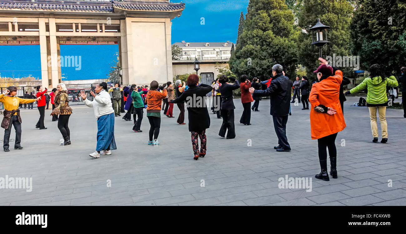 Early morning exercise in the garden of the Temple of Heaven in Beijing ...