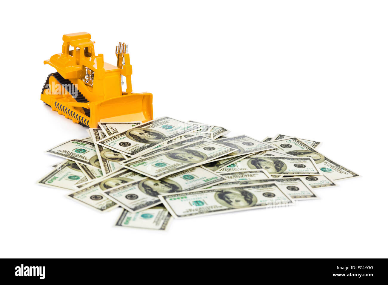 Toy bulldozer and money Stock Photo - Alamy