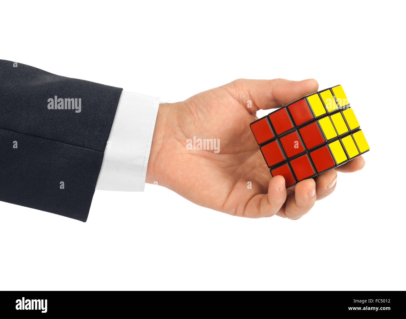 Cube puzzle in hand Stock Photo - Alamy