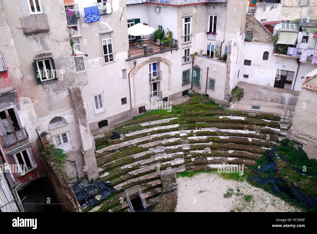 Naples, Italy. The Roman theater of Neapolis surrounded by the houses ...