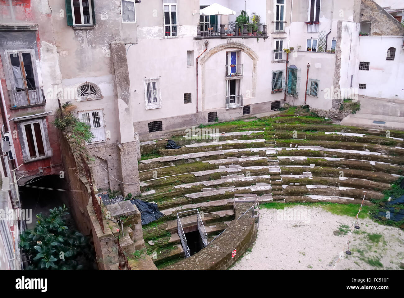 Naples, Italy. The Roman theater of Neapolis surrounded by the houses ...