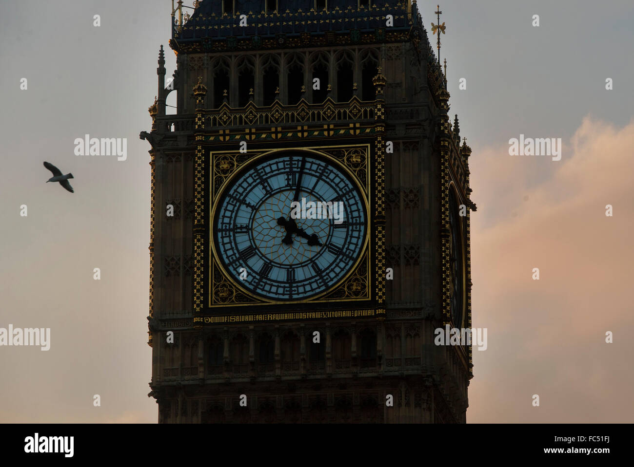 The sun sets behind Big Ben in London Stock Photo - Alamy