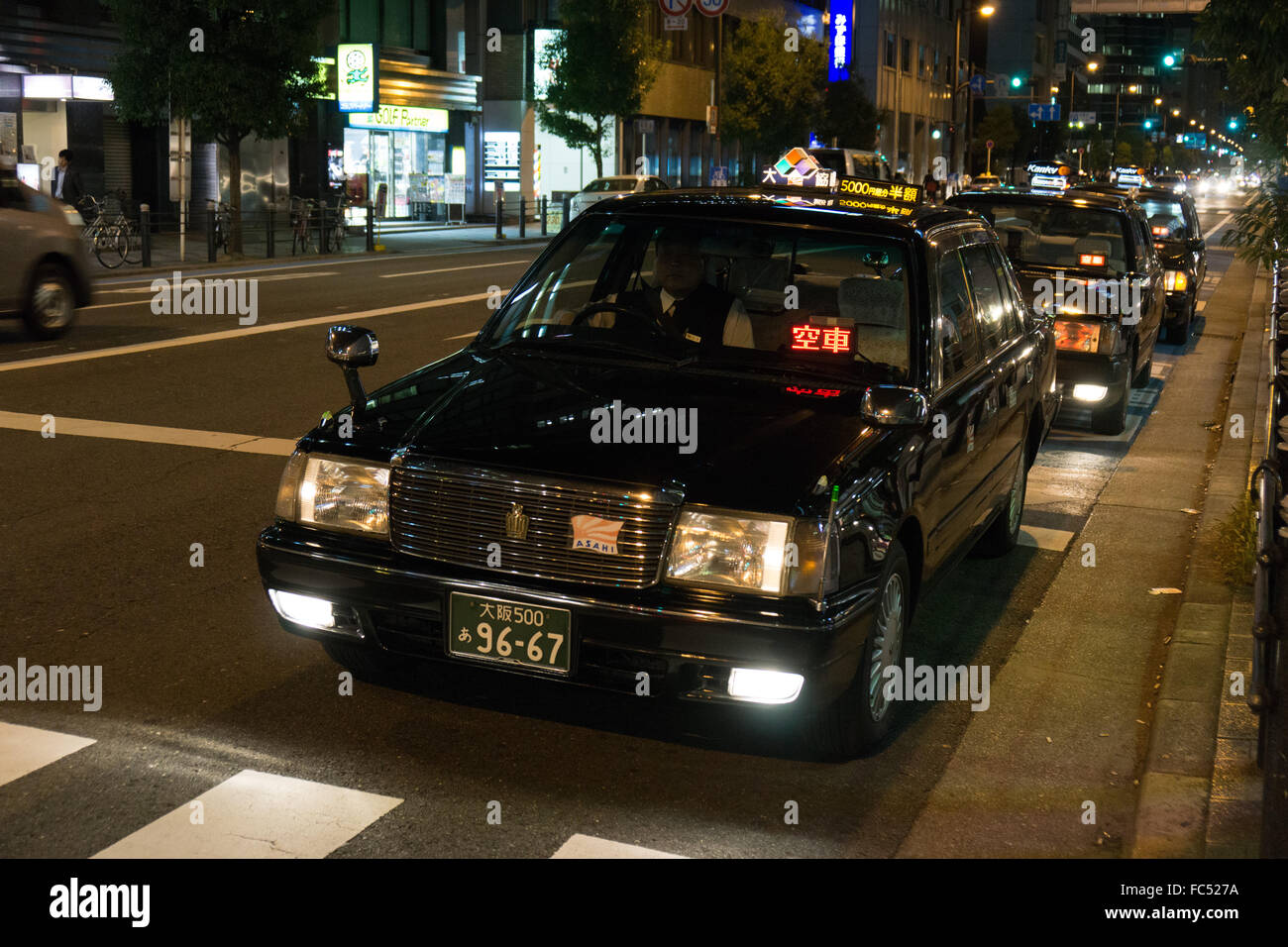 taxi cabs Osaka Japan Stock Photo - Alamy