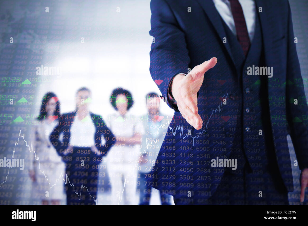 Composite image of businessman ready to shake hand Stock Photo - Alamy
