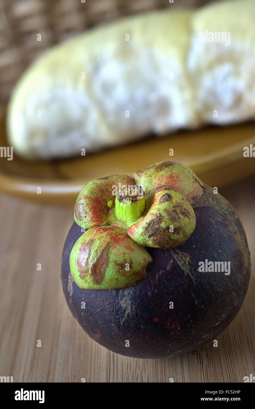A Mangosteen and a Durian Segment Stock Photo - Alamy