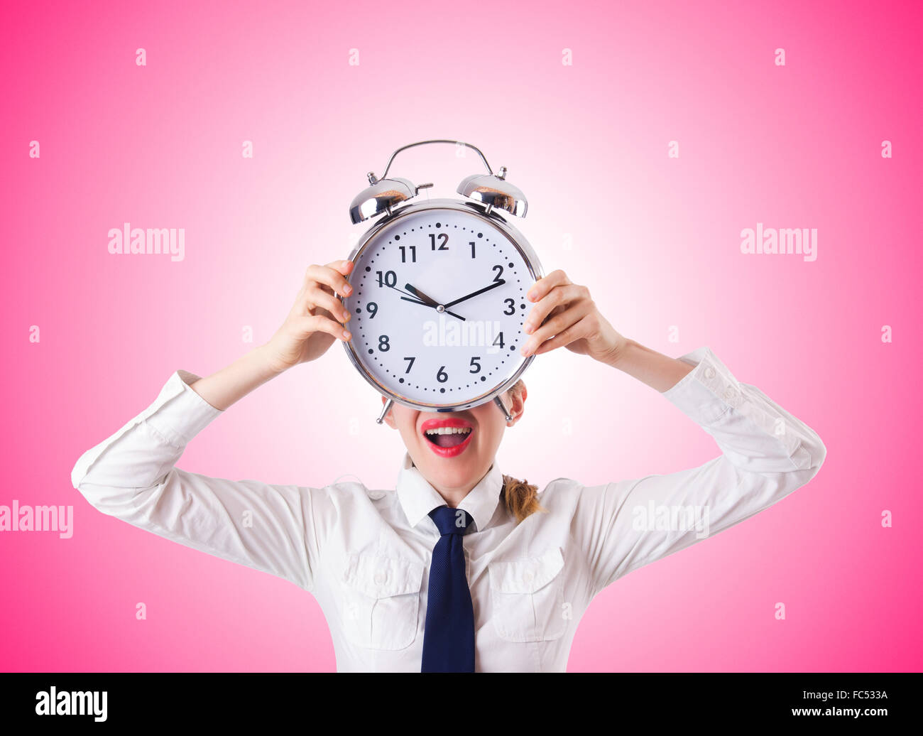 Woman businesswoman with giant clock Stock Photo - Alamy