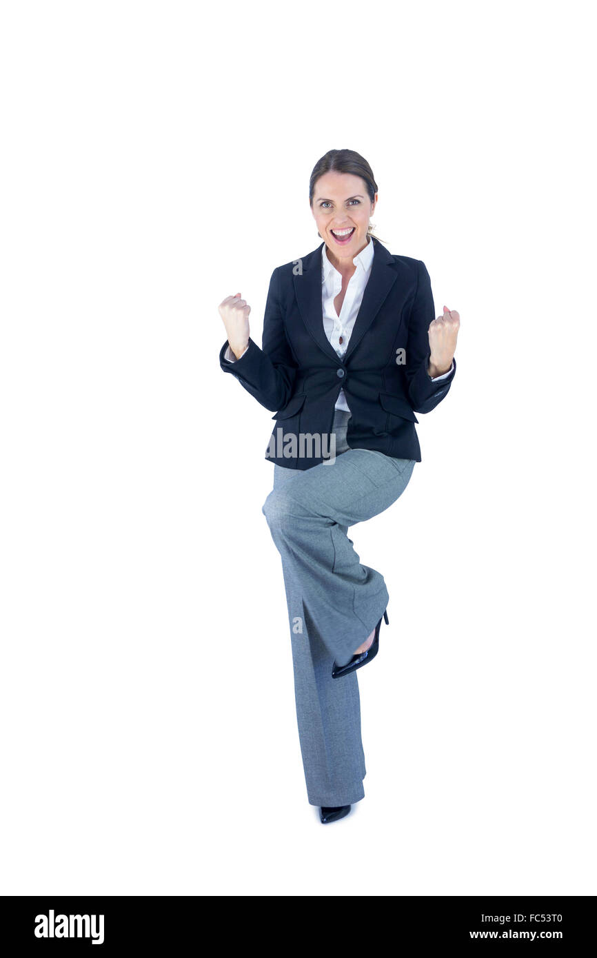 Portrait of a businesswoman doing a victory pose Stock Photo - Alamy