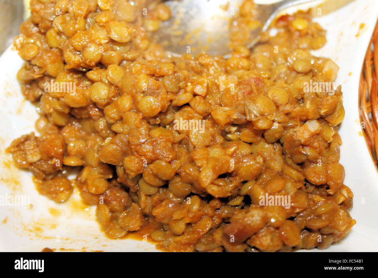 lentils with onion, tomato in the plate Stock Photo - Alamy