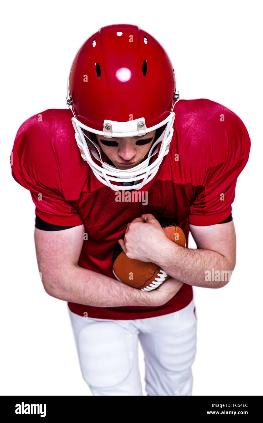 American football player running with the ball Stock Photo - Alamy