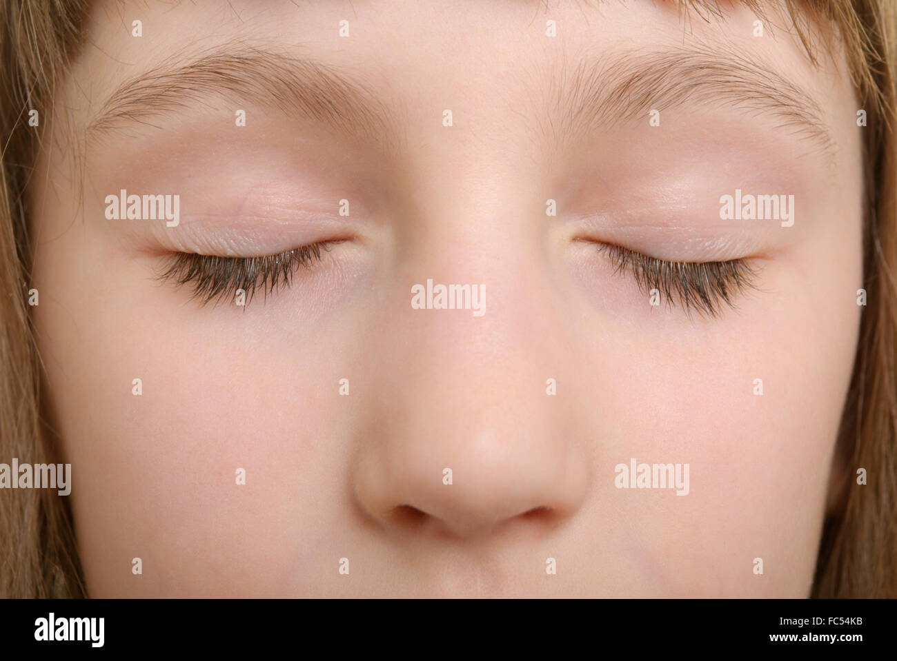 Girl's face blindly close up Stock Photo - Alamy