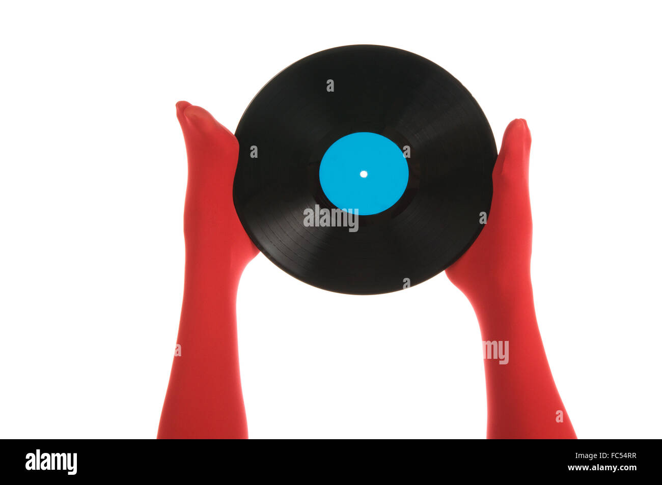 Female feet with vinyl record Stock Photo - Alamy