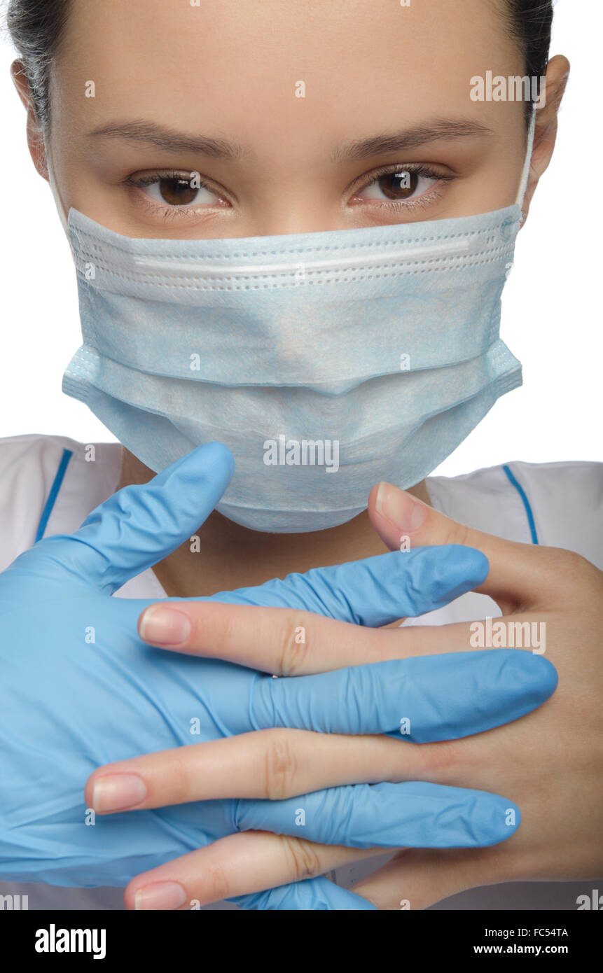 Doctor gloved hands folded Stock Photo - Alamy