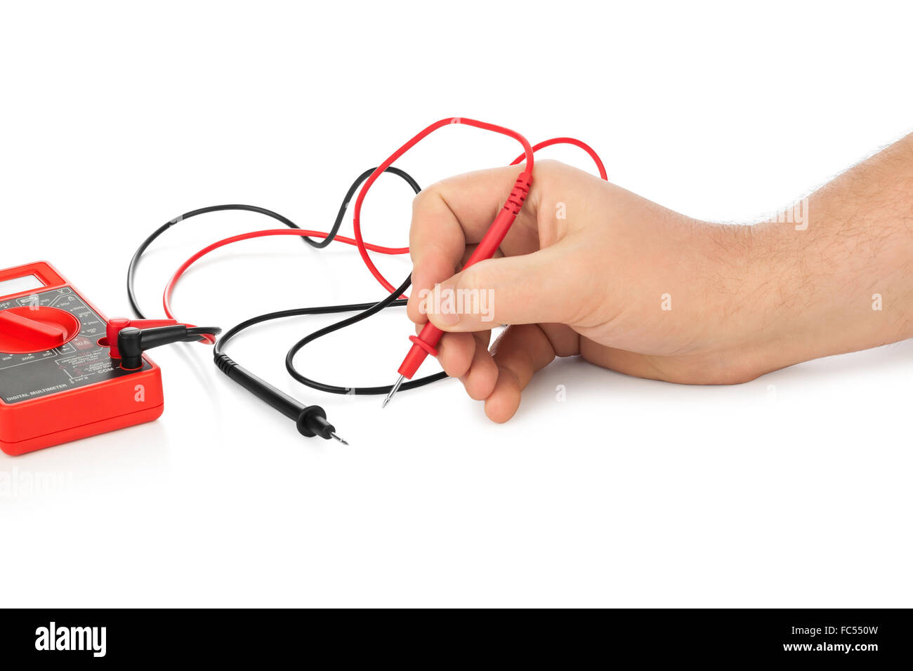 Hand and electric multimeter Stock Photo - Alamy