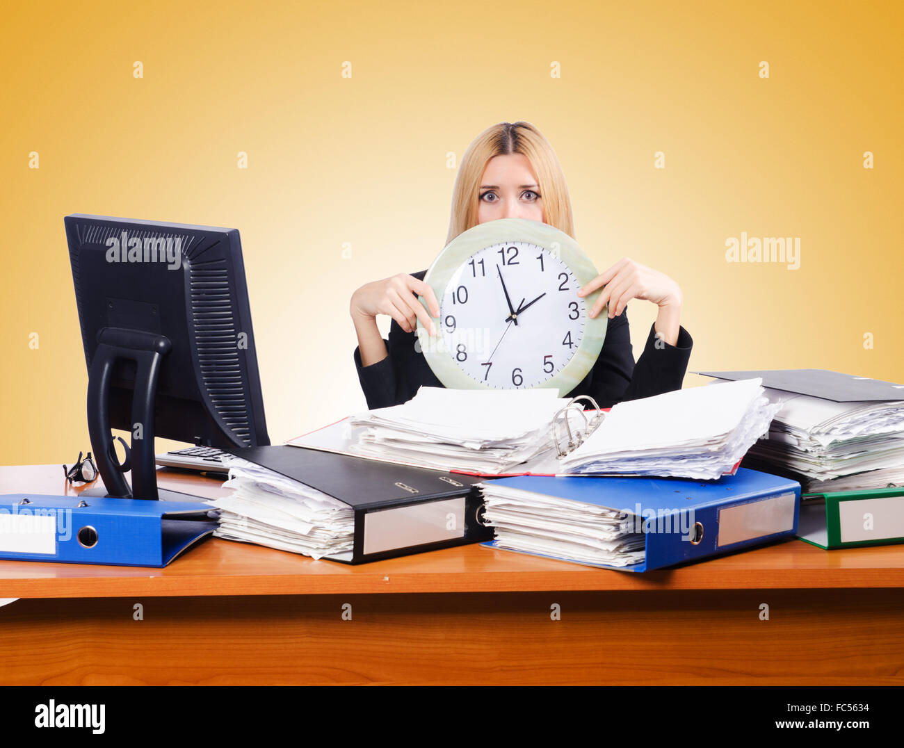 Woman under stree from too much work Stock Photo - Alamy