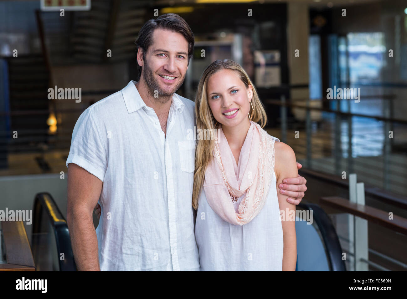 Putting arms around hi-res stock photography and images - Alamy
