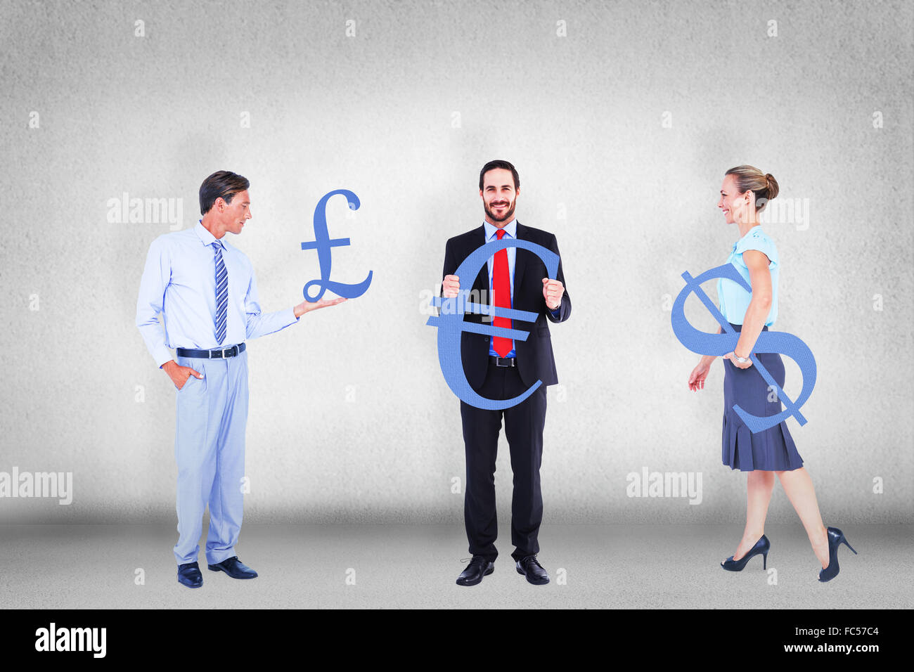 Composite image of business people holding cogs Stock Photo - Alamy