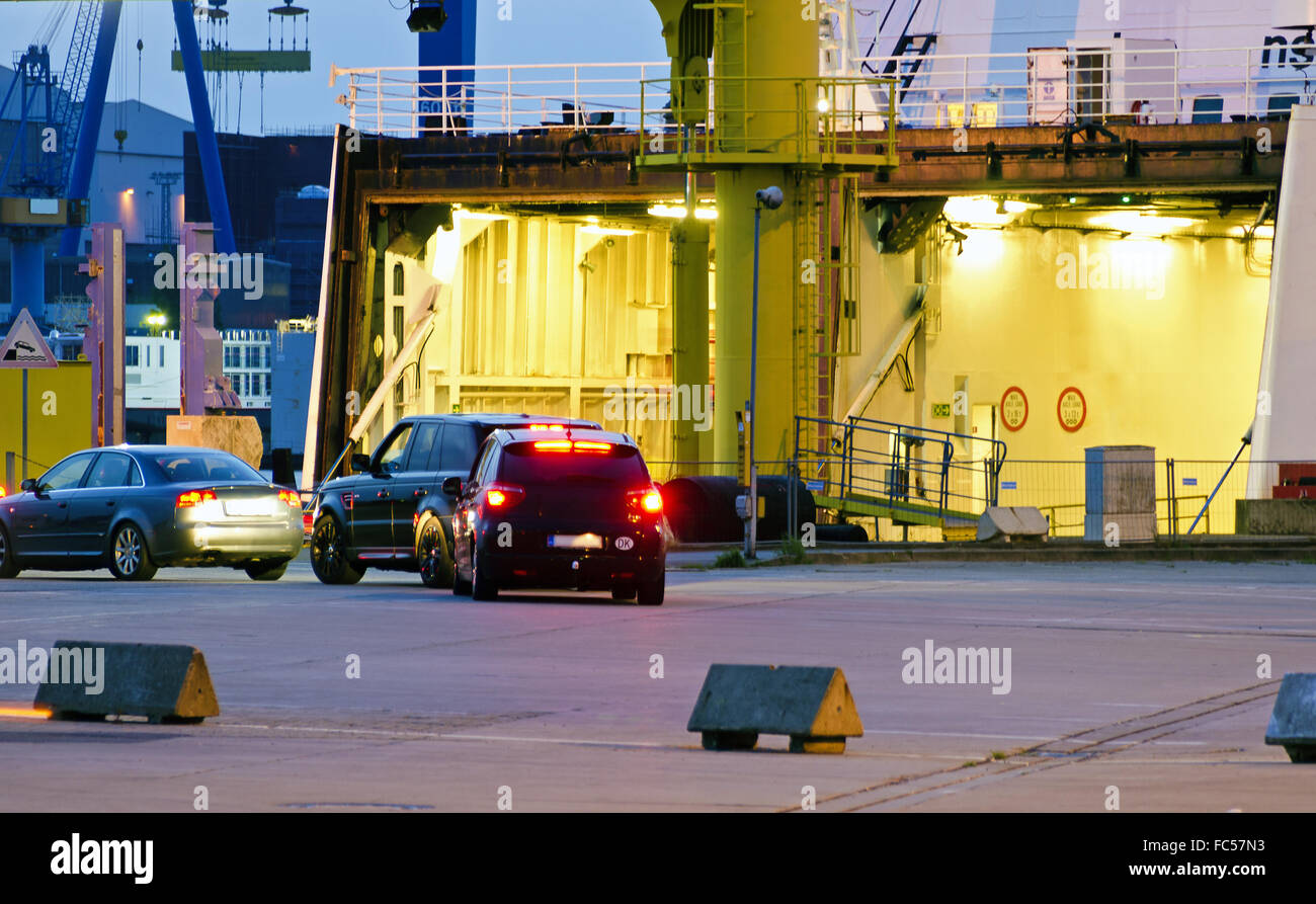 cars on the approach to a ferry ship Stock Photo - Alamy
