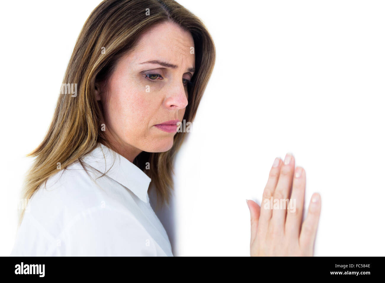 Female leaning against wall Cut Out Stock Images & Pictures - Alamy