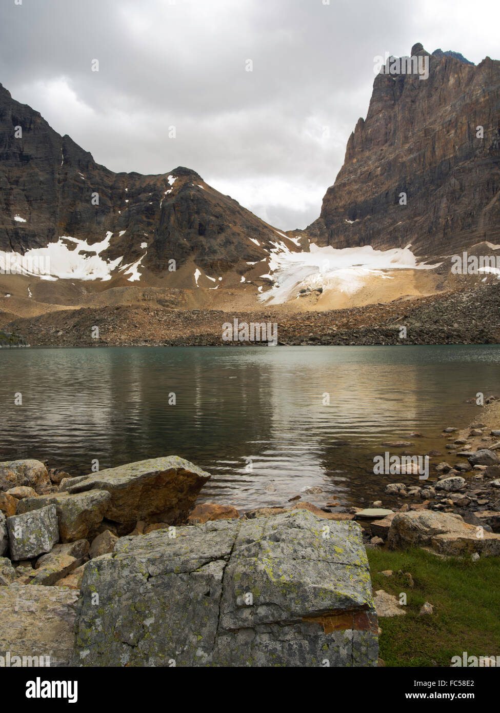 Camp by an emerald green glacier lake hi-res stock photography and ...