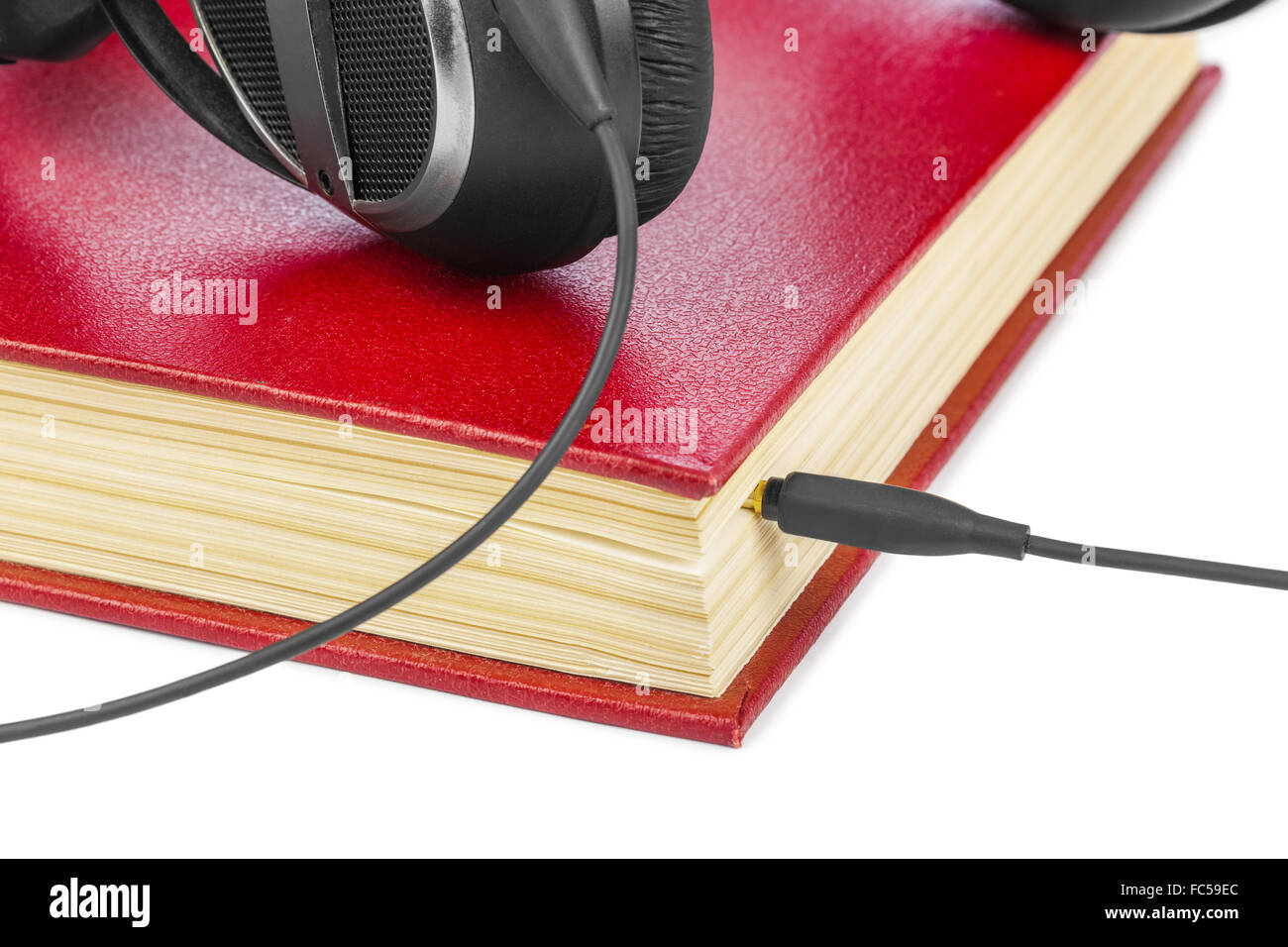 Headphones and book Stock Photo - Alamy