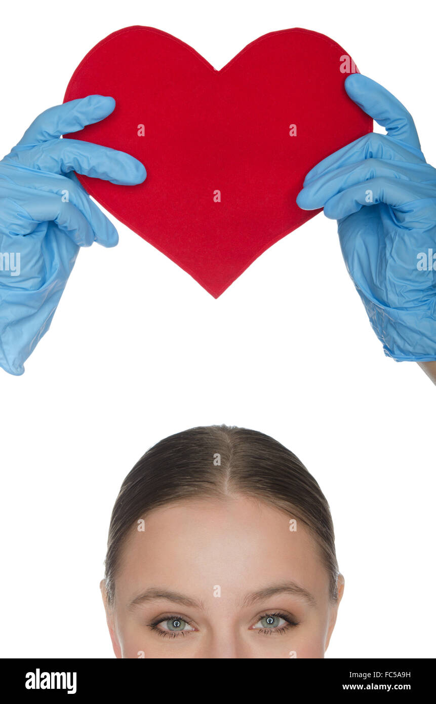 Woman held up a heart symbol Stock Photo - Alamy