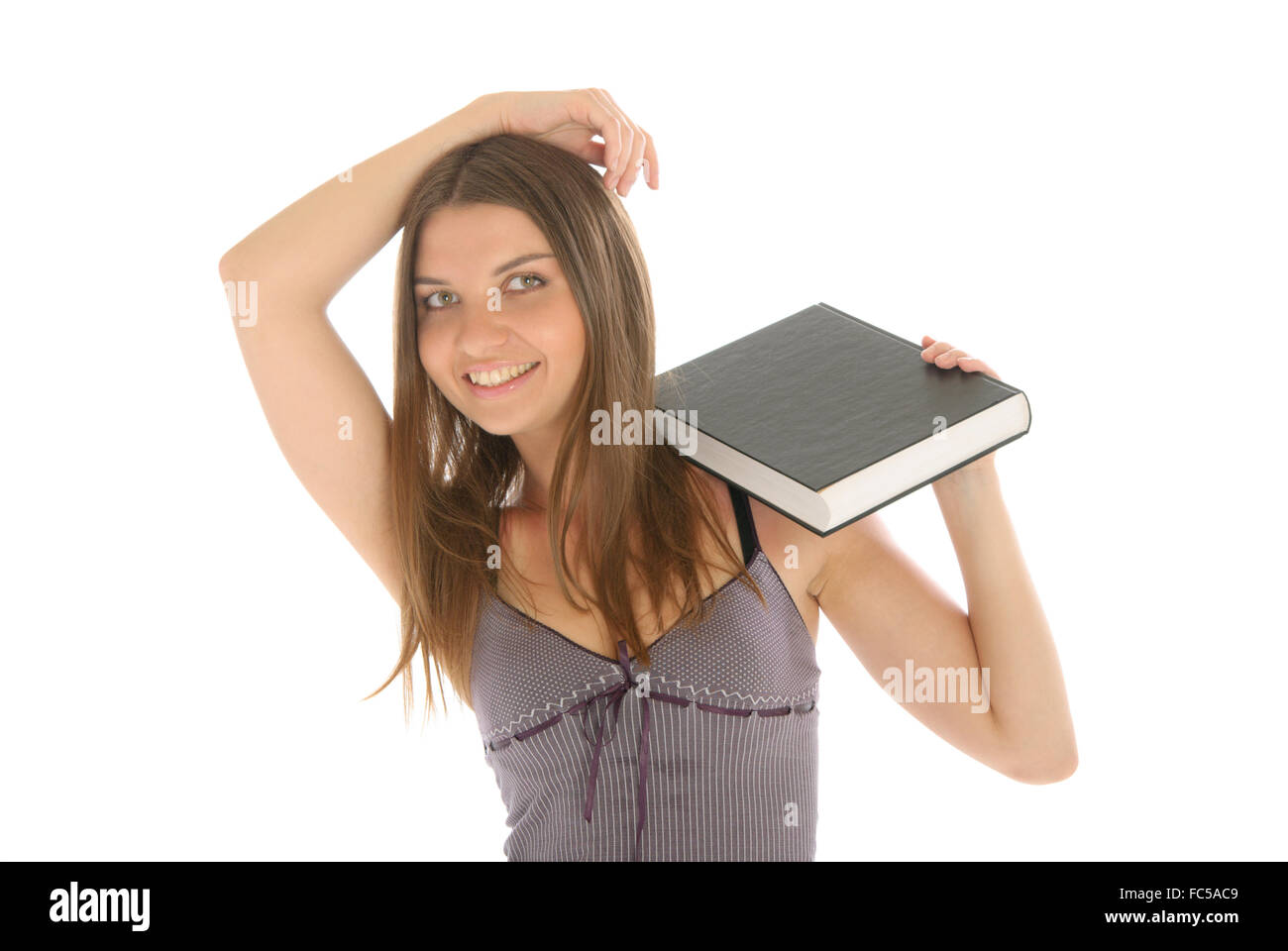 Young happy woman with book Stock Photo - Alamy