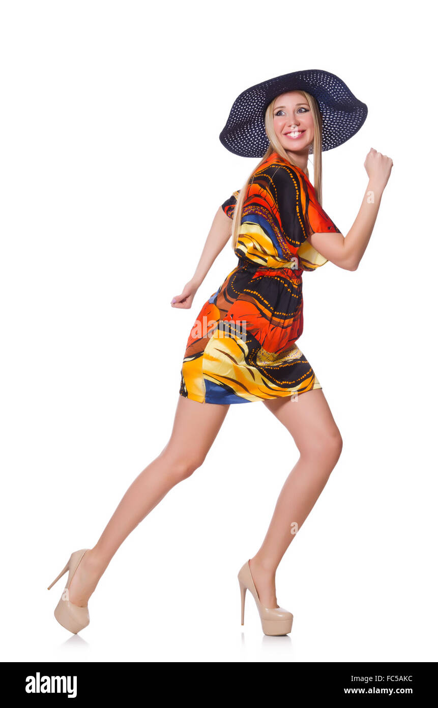 Pretty young woman in short dress isolated on white Stock Photo - Alamy
