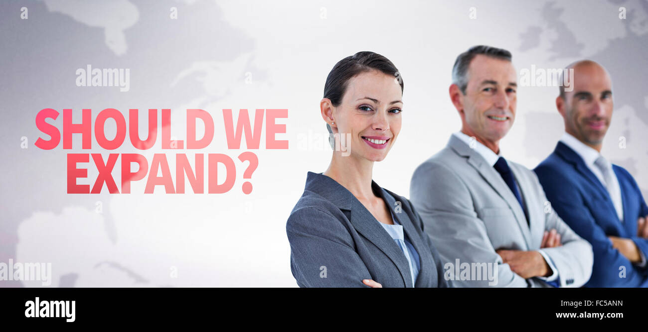 Composite image of business colleagues smiling at camera Stock Photo - Alamy